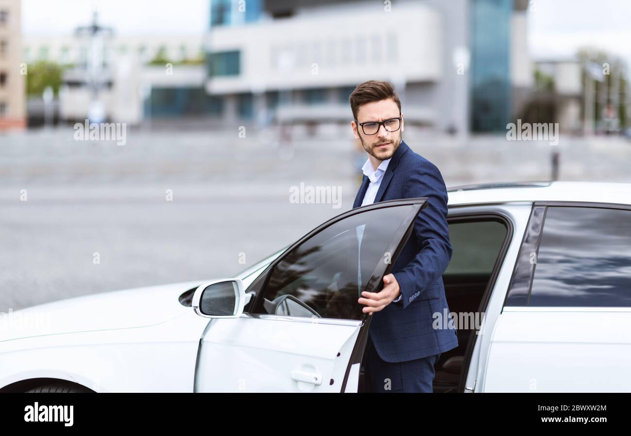 Man getting in automobile hi-res stock photography and images - Alamy
