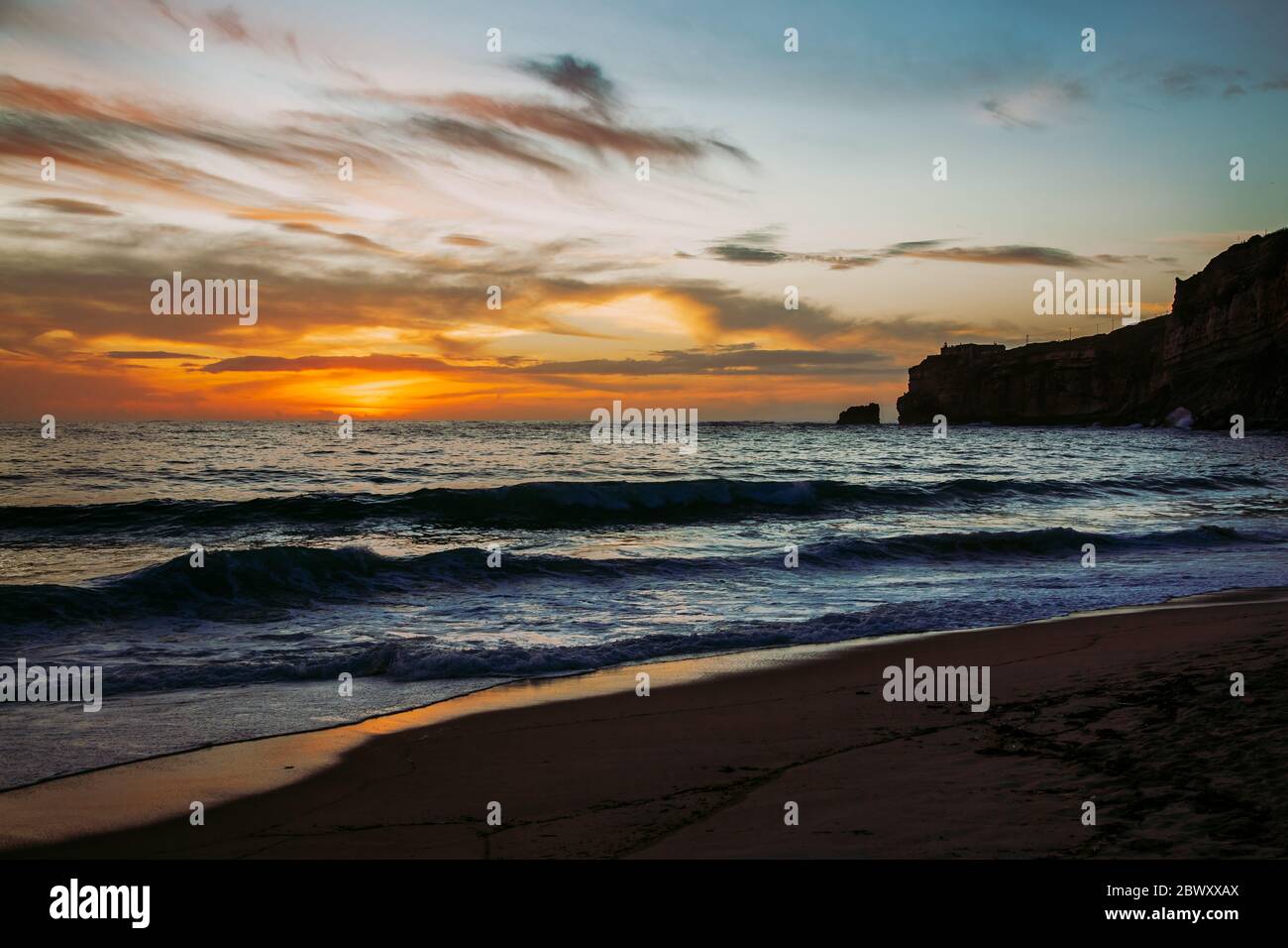 Portugal beach atlantic ocean sunset hi-res stock photography and ...