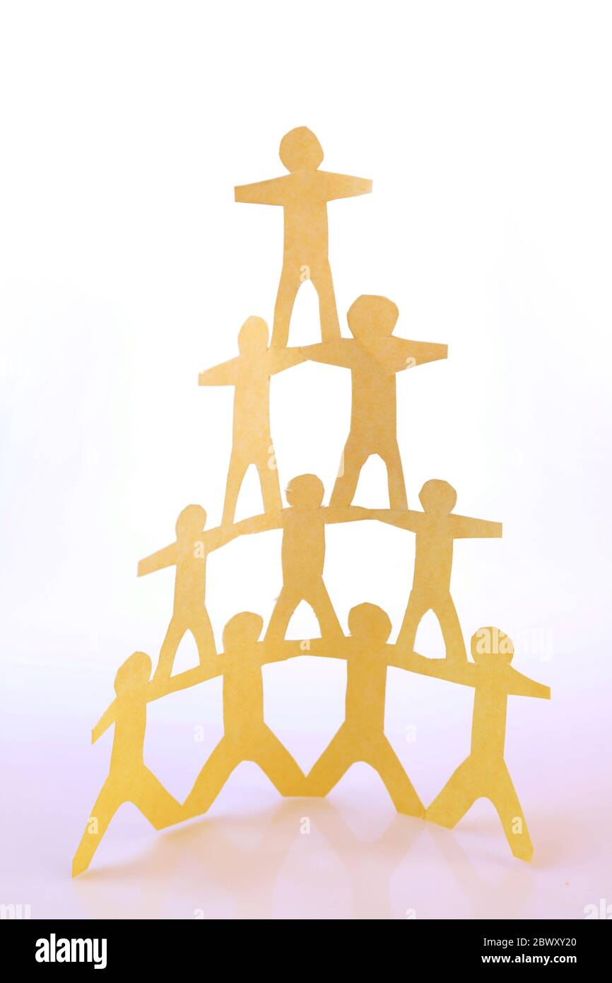 Human team pyramid supporting each other Stock Photo - Alamy