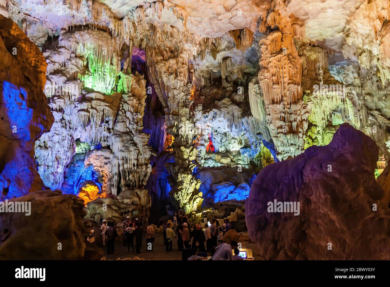 Stalactite and stalagmite formations in a limestone cave of Halong Bay ...