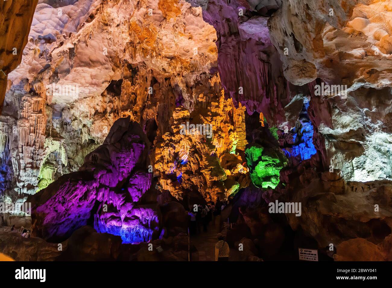 Stalactite and stalagmite formations in a limestone cave of Halong Bay ...