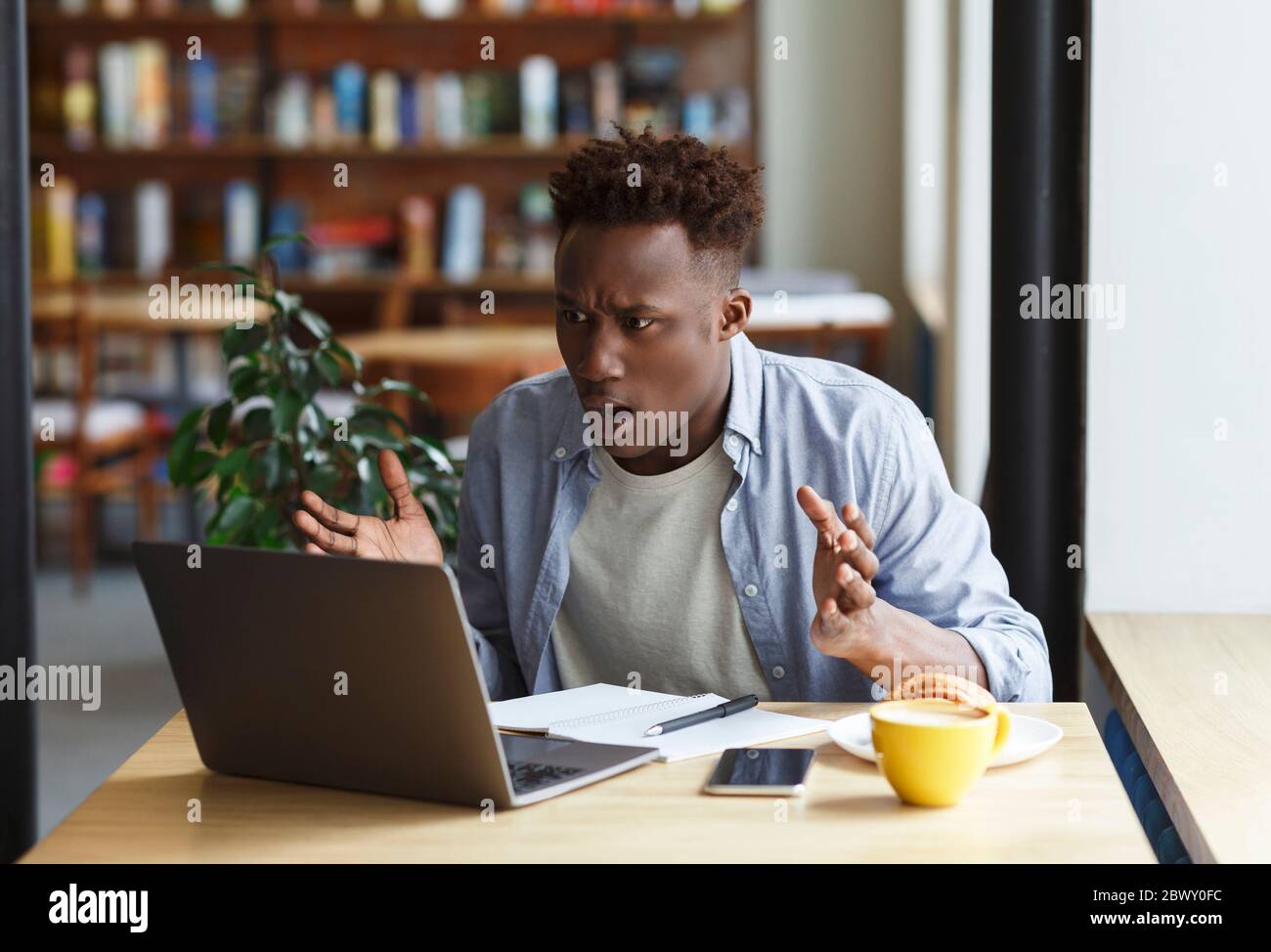 Laptop frustrated library hi-res stock photography and images - Alamy