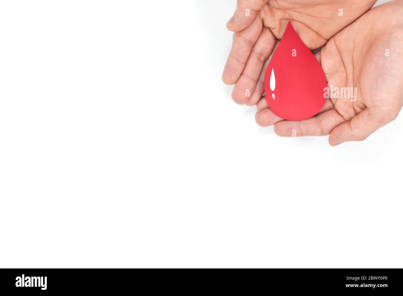 Male hands holding blood drop. Donation, anemia and transfusion concept ...