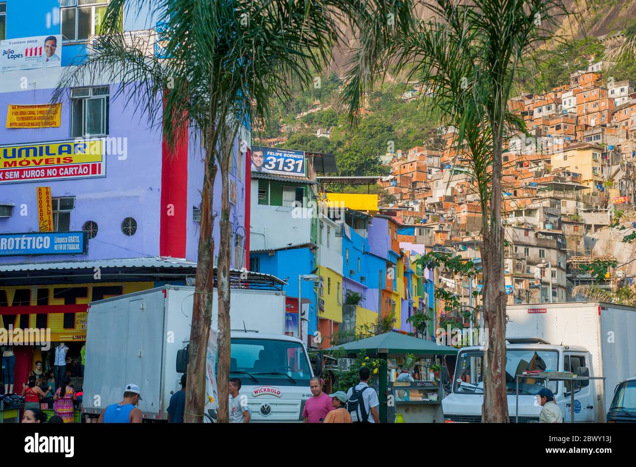 Street scene with colorful painted houses in the Rocinha favela, the ...