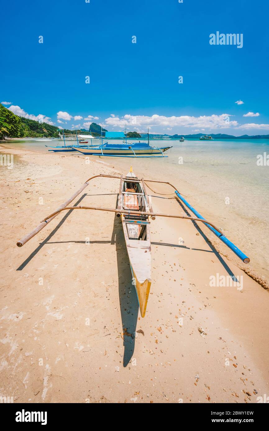Philippines beach landscape - Banca boat at Corong Corong beach in El ...
