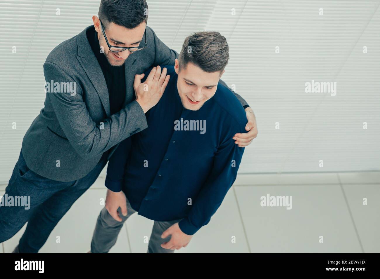 top view. Manager introducing a new employee Stock Photo - Alamy