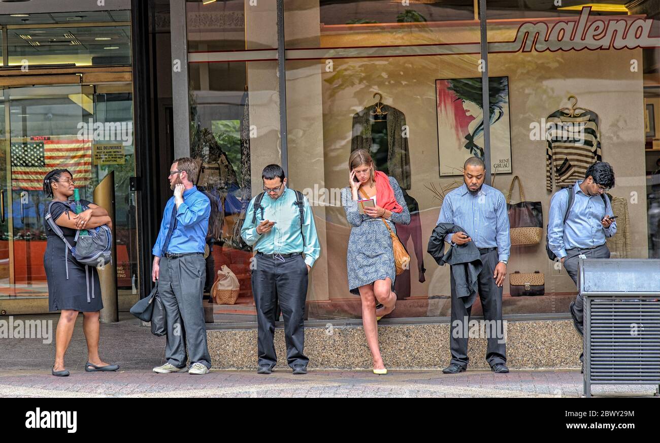 Waiting for the bus in Downtown Washington DC during rush hour Stock ...