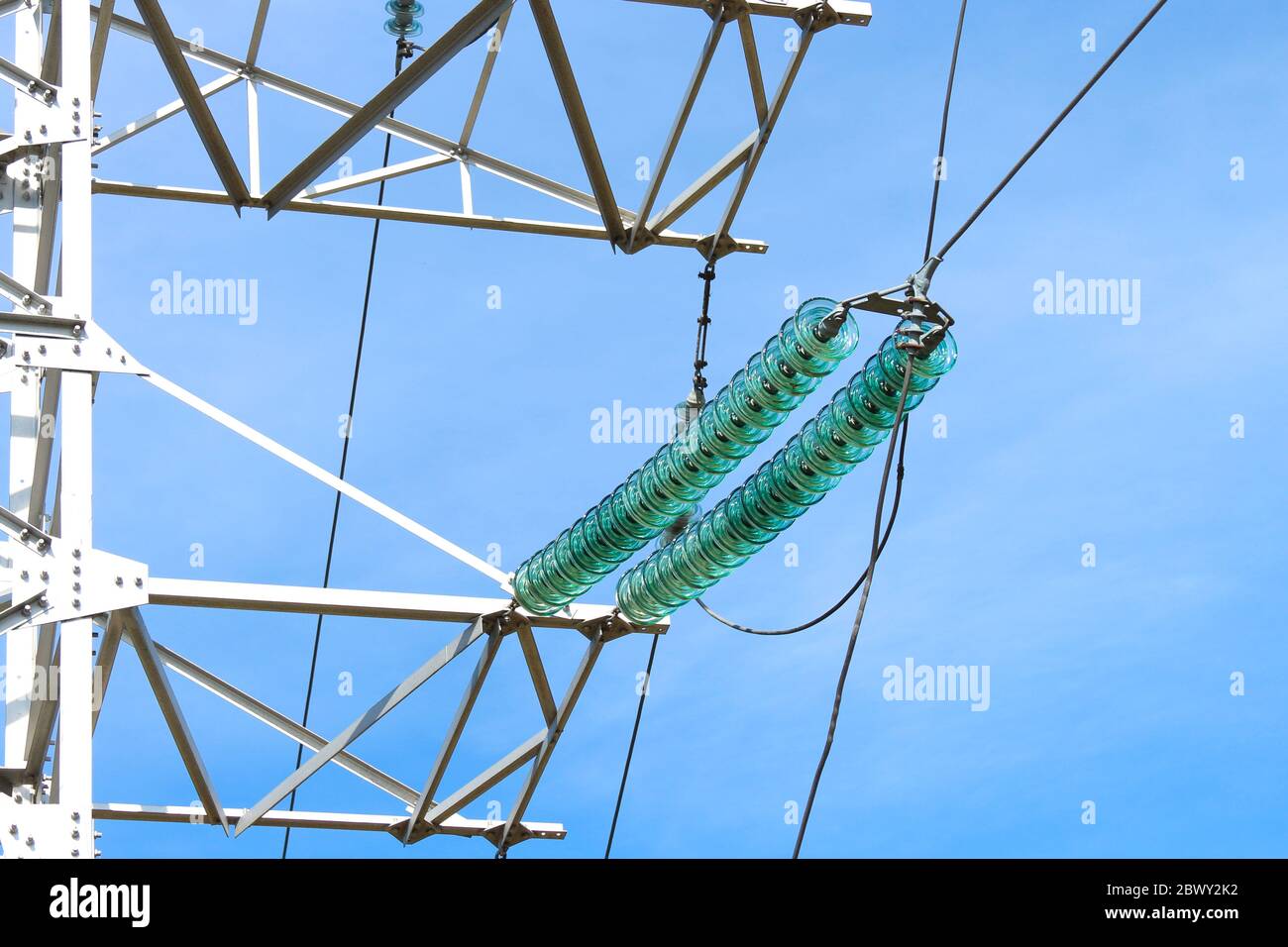 Electric pole with wires against the blue sky. Transmitting tower. high ...