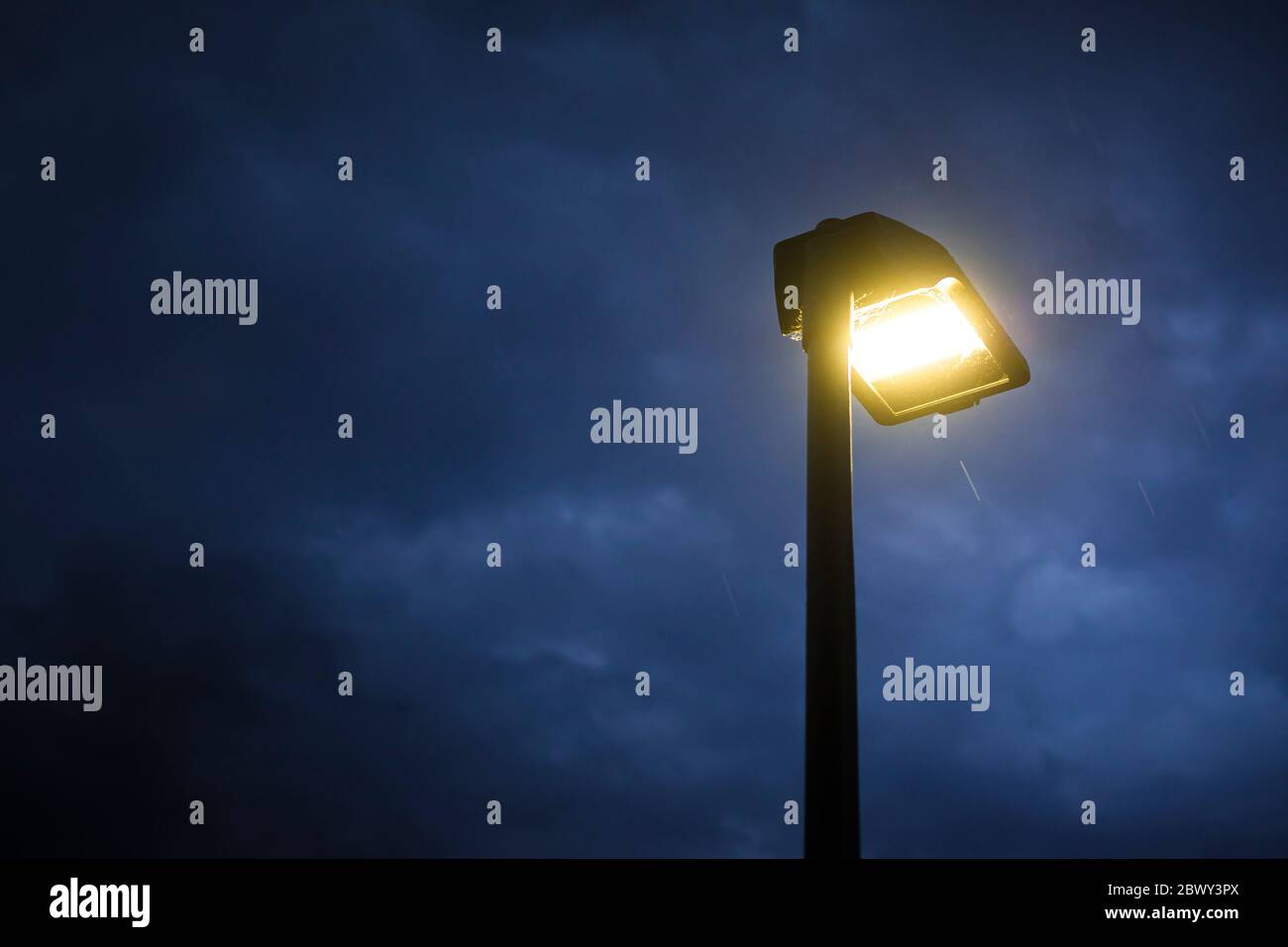 Street Lamp At Night In The Rain