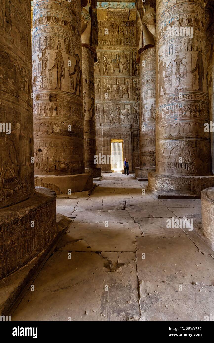 Hieroglyphics on the walls and large Hathor-head capitals of the ...