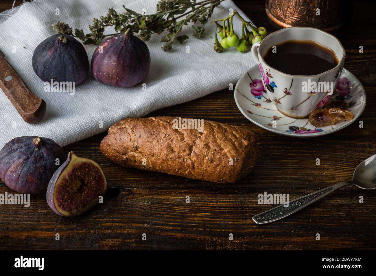Light coffee break with multicereal bun and few ripe figs Stock Photo ...