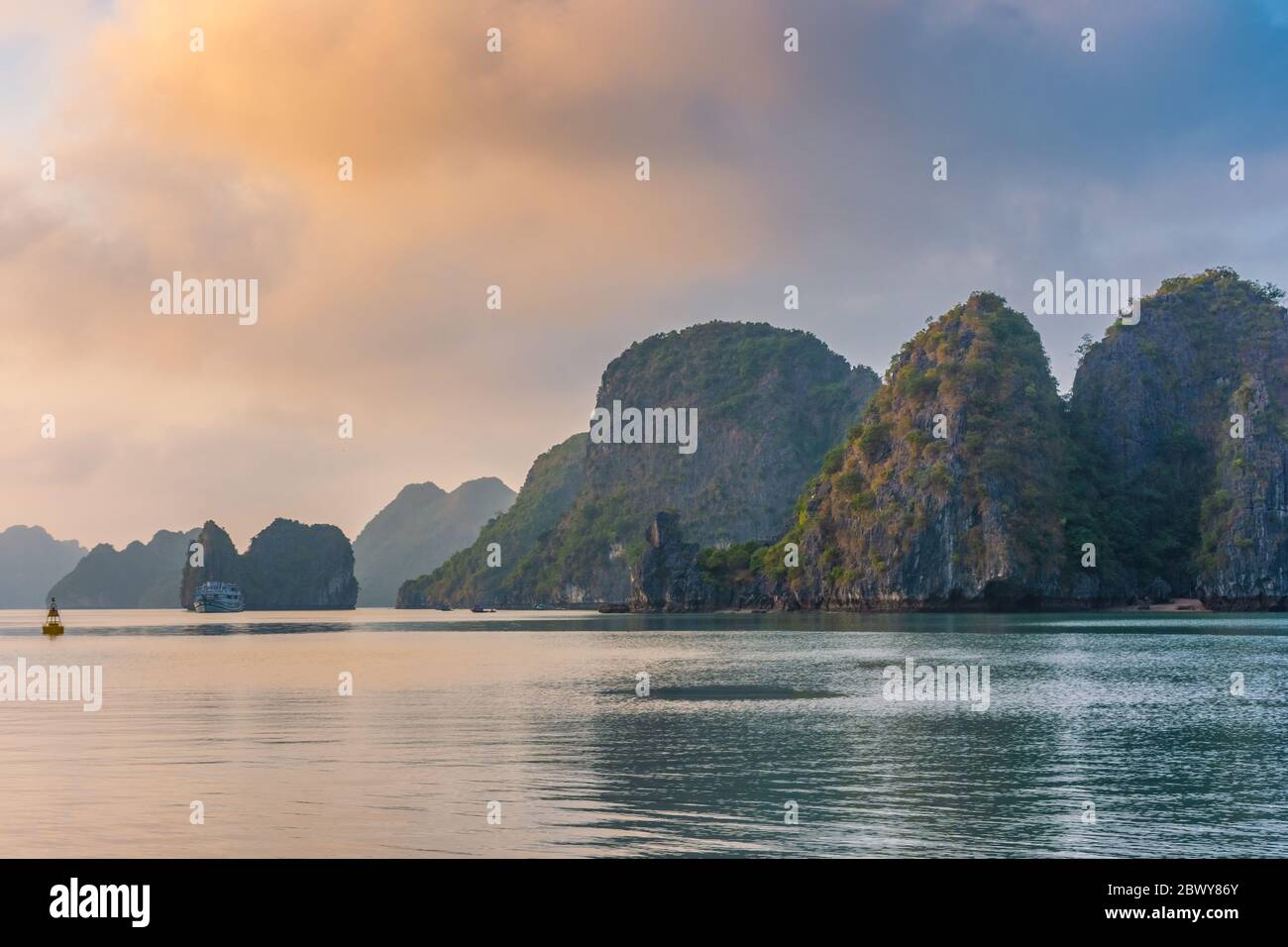 Colorful sunset over Ha Long Bay, Vietnam Stock Photo - Alamy
