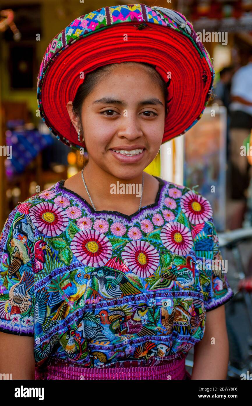 Portrait of a teenage Mayan girl in traditional dress in the town of ...