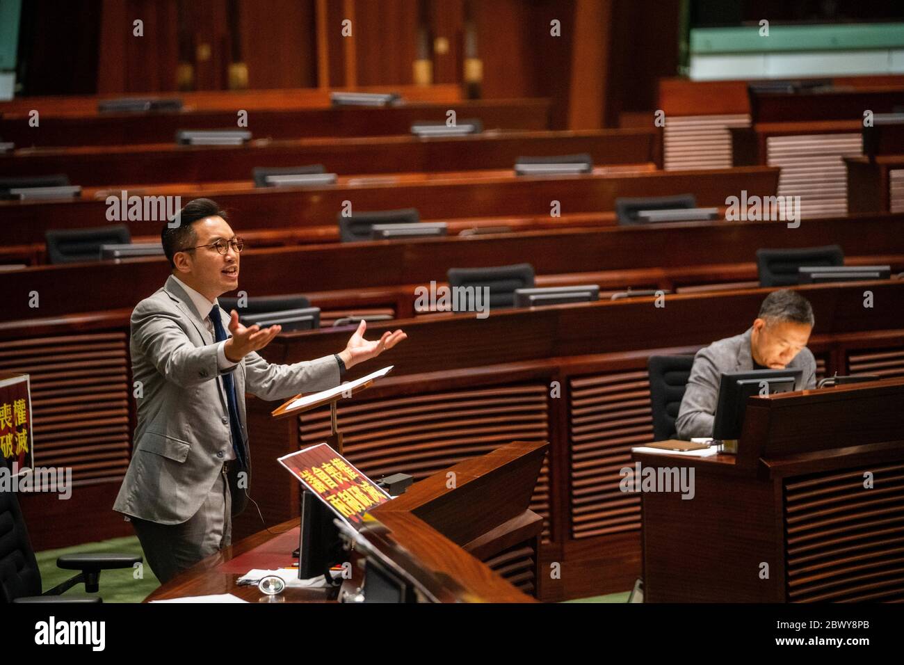 Legislative member Alvin Yeung of Civic Party reacts as he spoke during ...