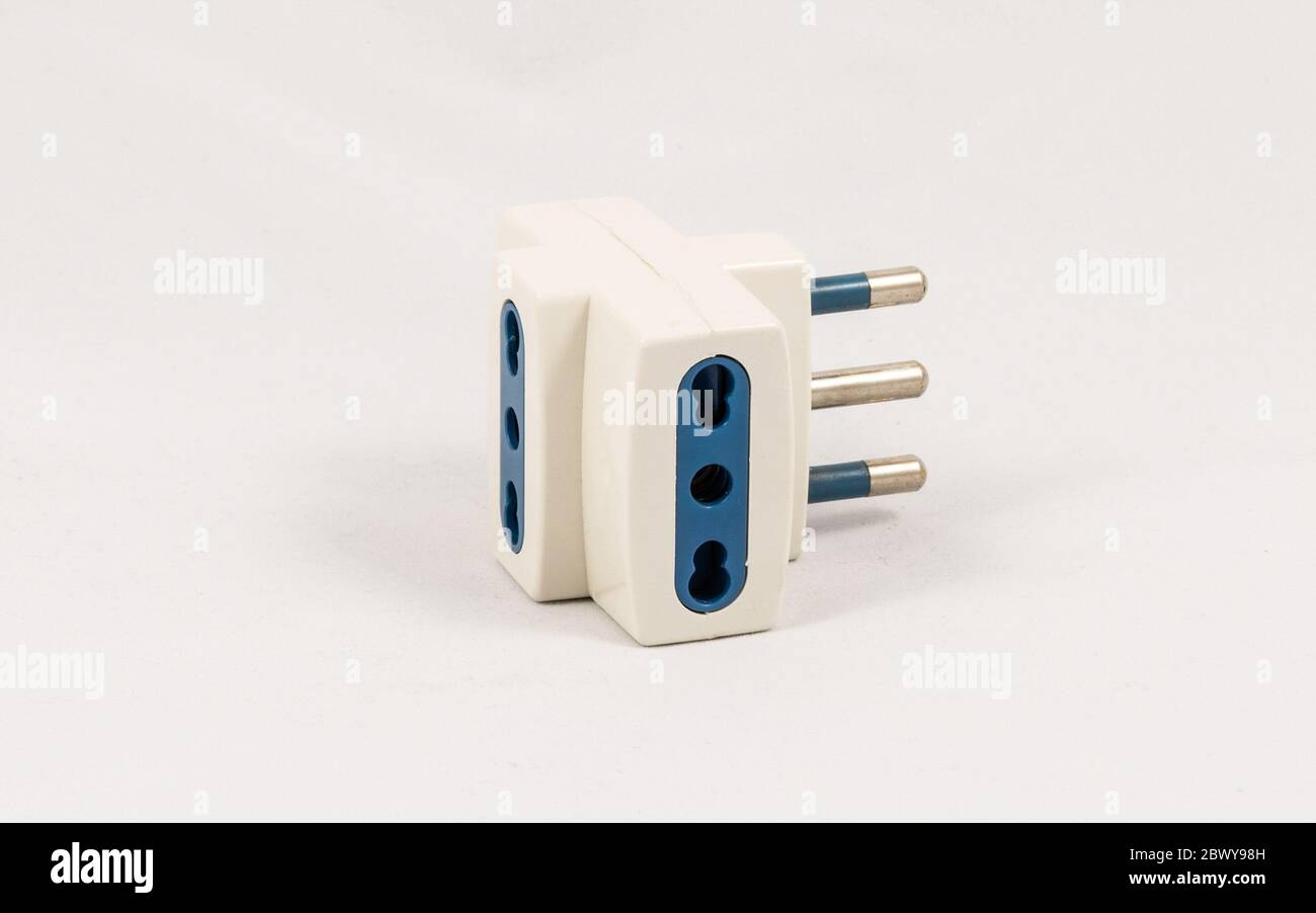 Three way EU electric plug adaptor, isolated on white background Stock ...