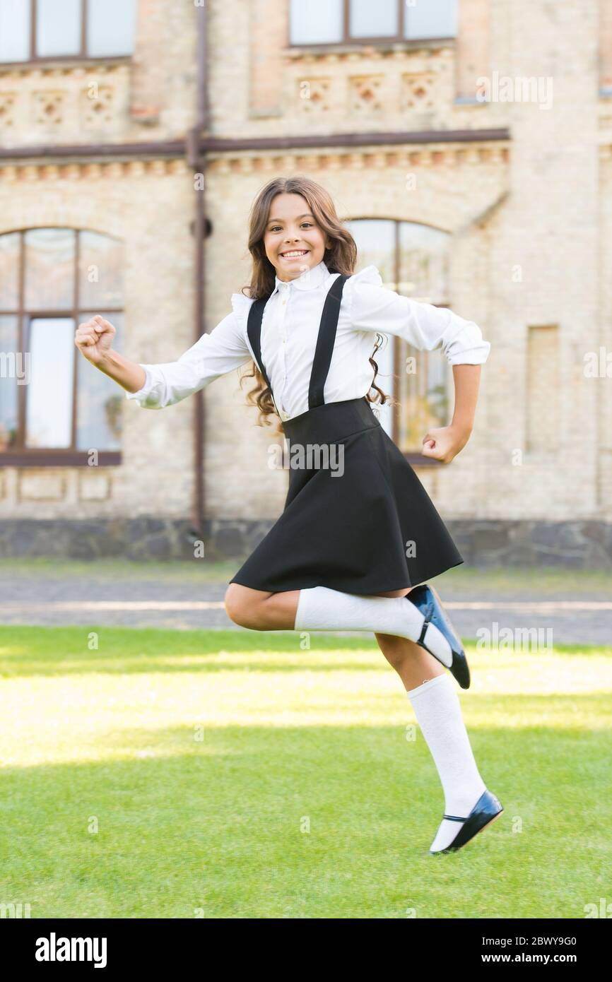 small student girl run towards knowledge. back to school. little girl ...