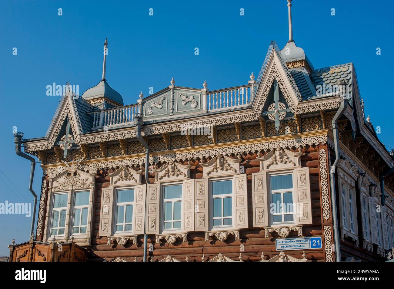 A traditional old wooden house, decorated with wooden, hand-made ...