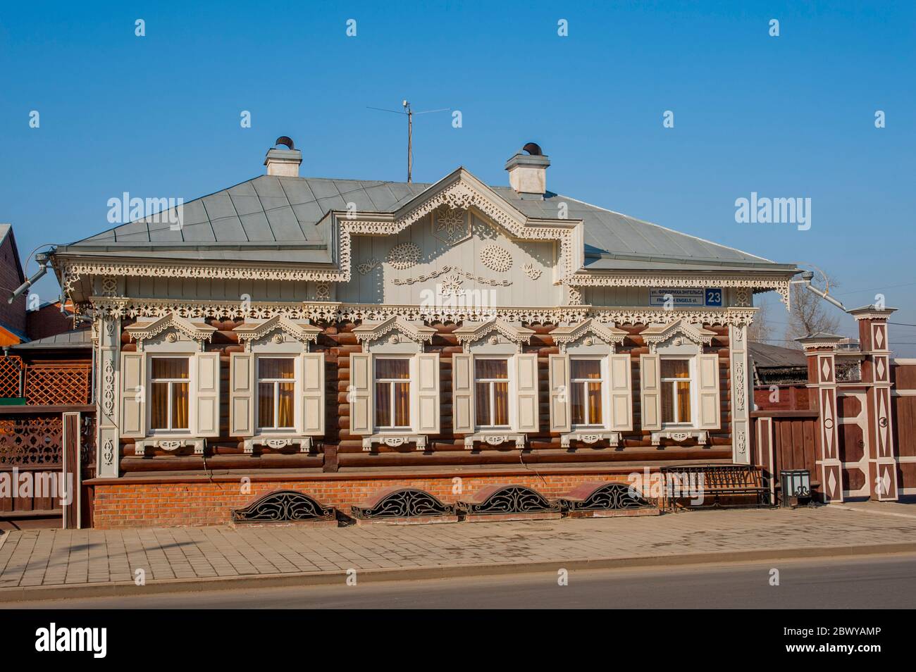 A traditional old wooden house, decorated with wooden, hand-made ...