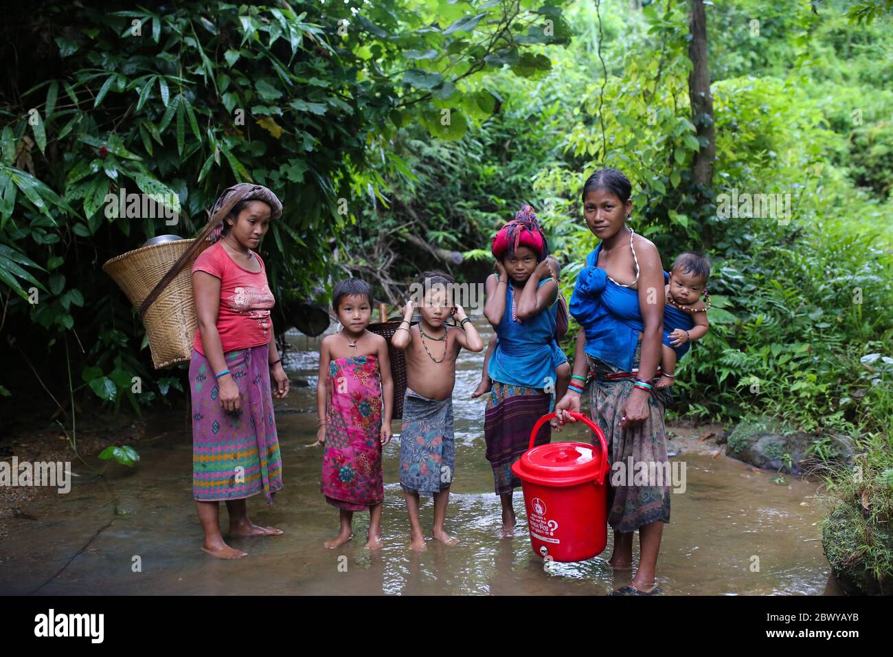 Indigenous people make their way through the jungle at Thanchi in ...