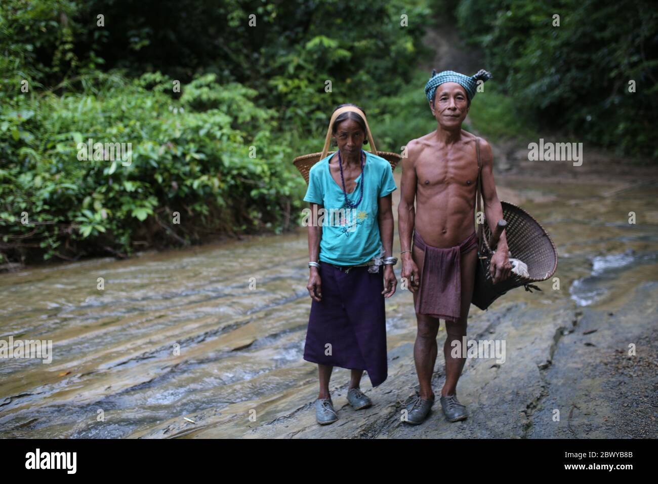 Indigenous people pose for photograph at a village in Thanchi in ...