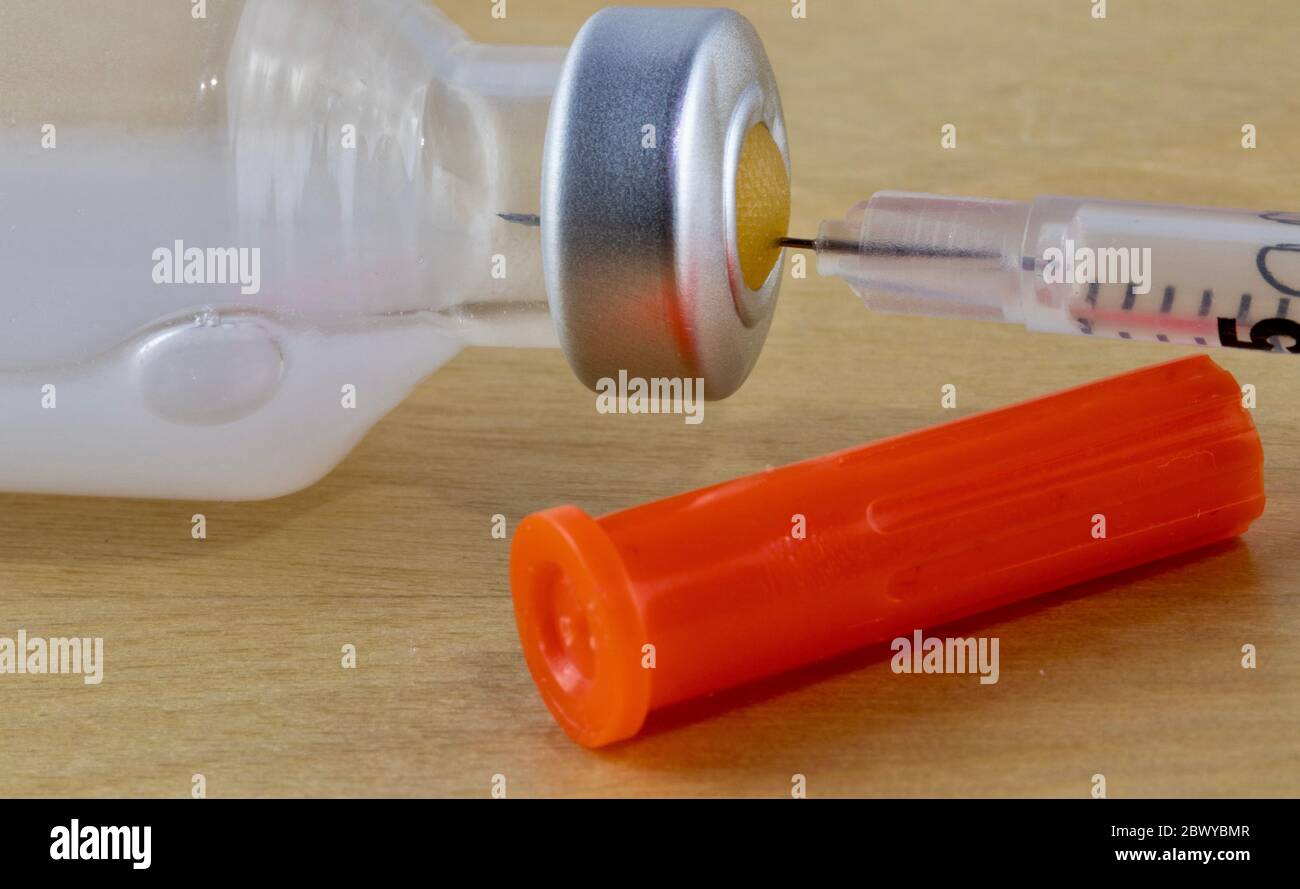 Syringe vaccine cap on hi-res stock photography and images - Alamy
