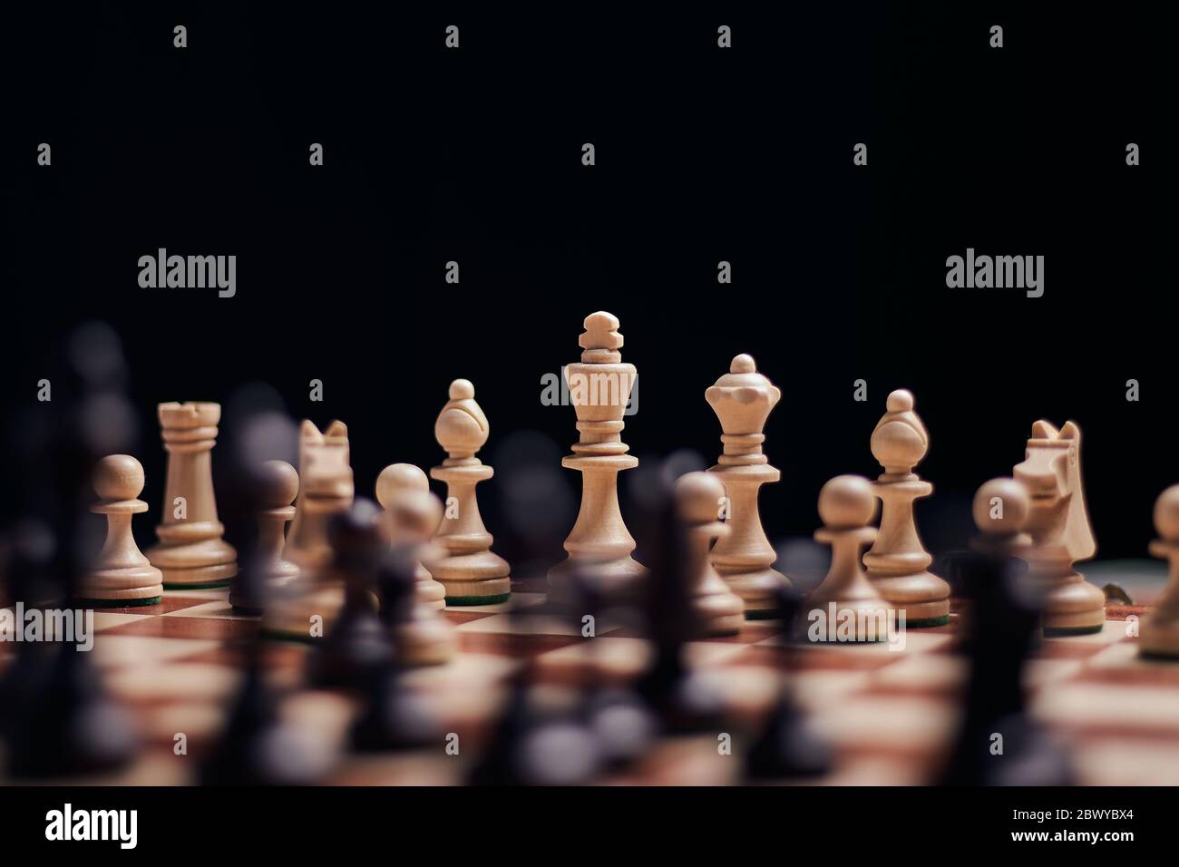 Chess board with large wooden chess pieces. Board game for the ...