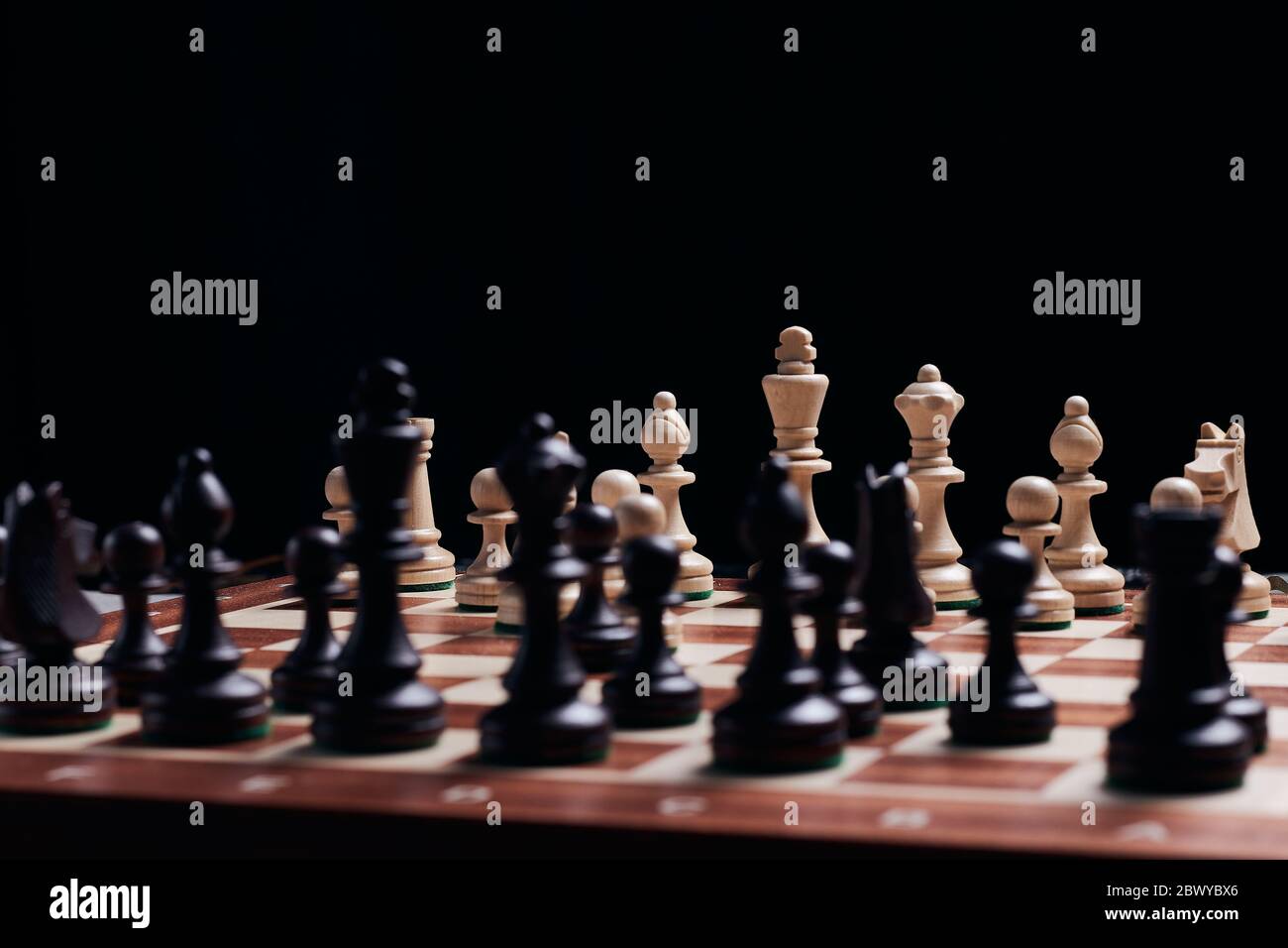 Chess board with large wooden chess pieces. Board game for the ...