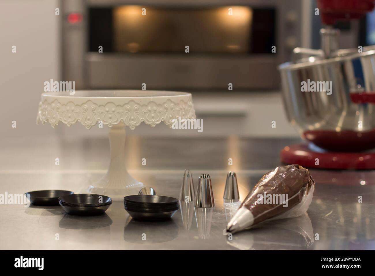 Detail of the preparation of macaron, french sweet food, inside a ...