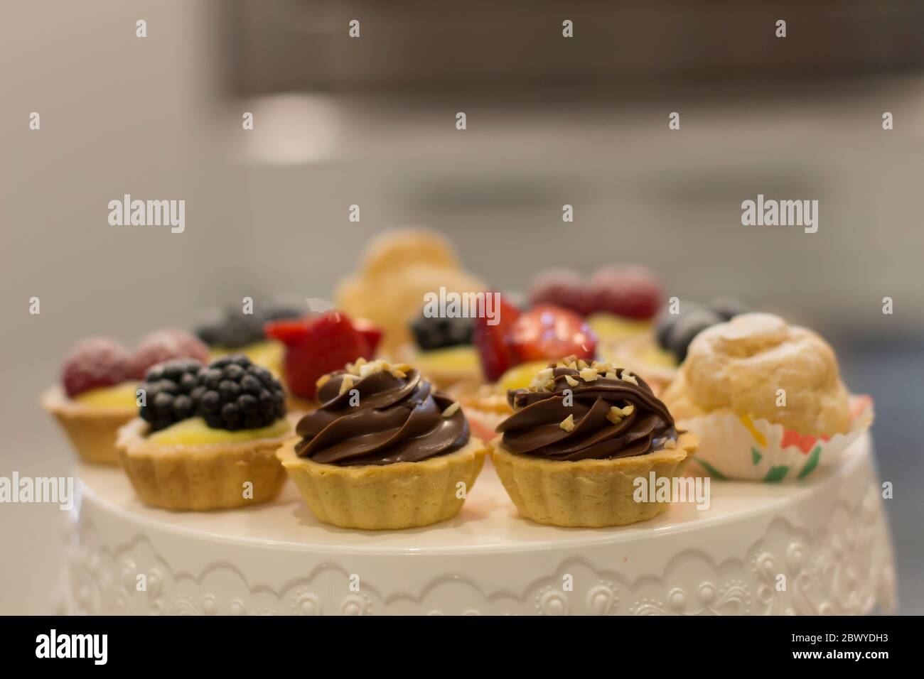 Detail of the preparation of macaron, french sweet food, inside a ...