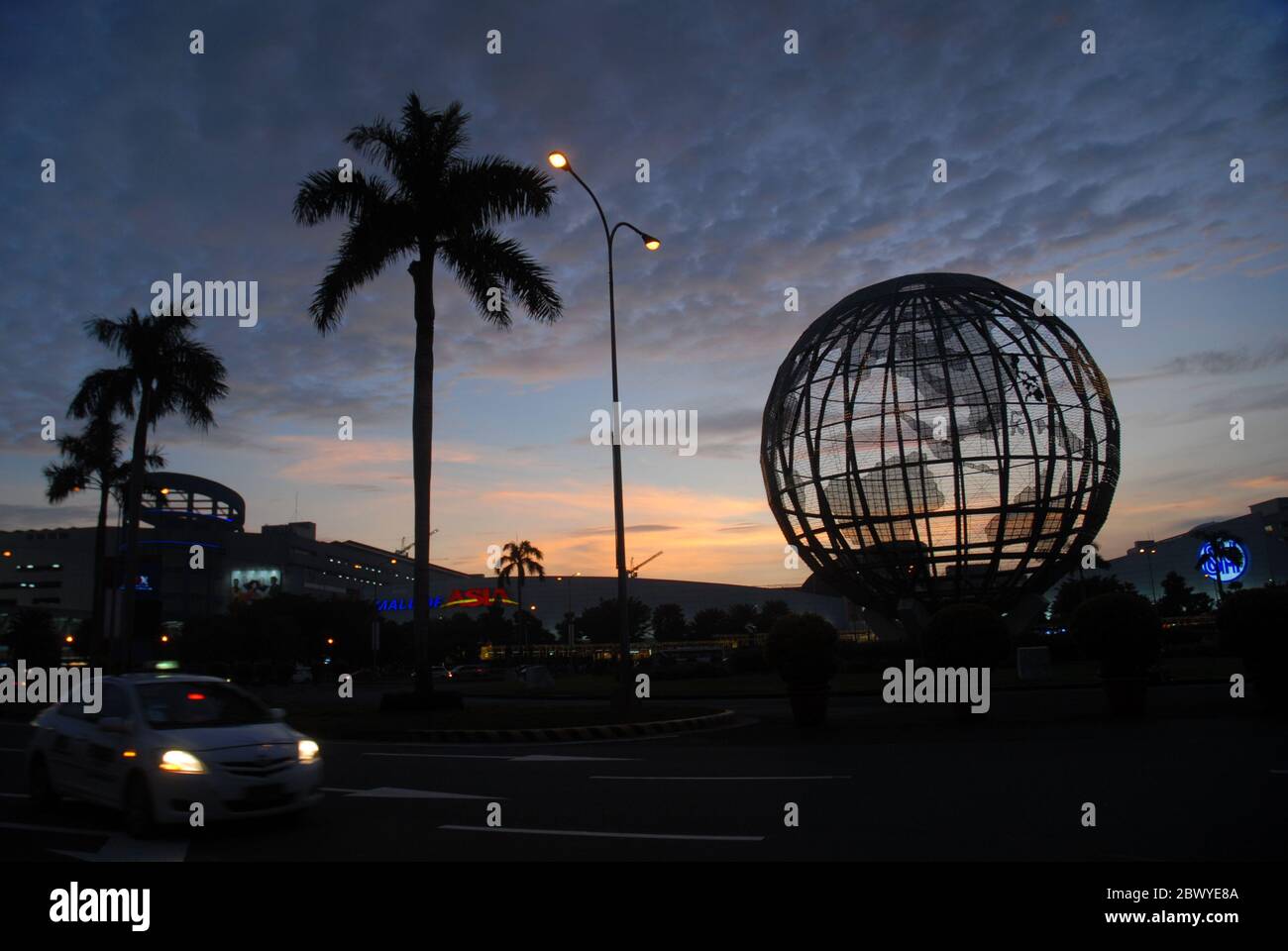 Giant Globe at dusk, in front of the Mall of Asia, Pasay City, Manila ...