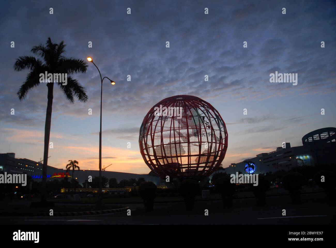 Giant Globe at dusk, in front of the Mall of Asia, Pasay City, Manila ...