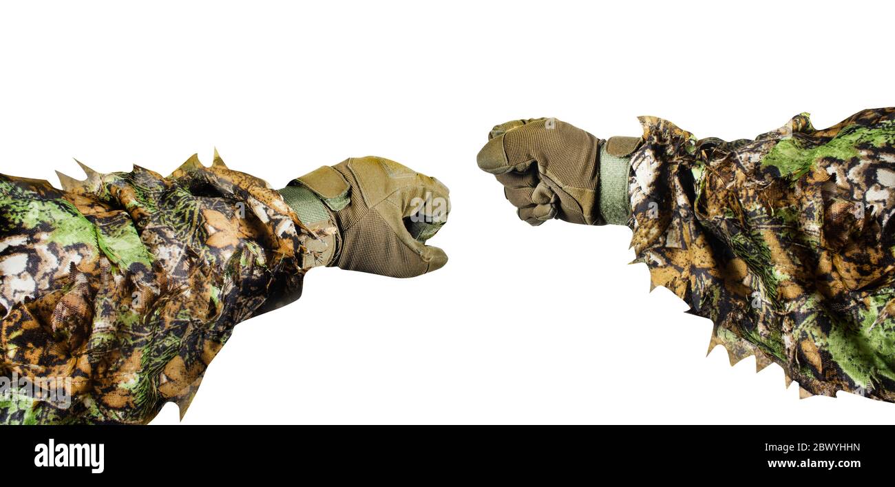 Isolated photo of a first person view hunter hands in camouflaged ...