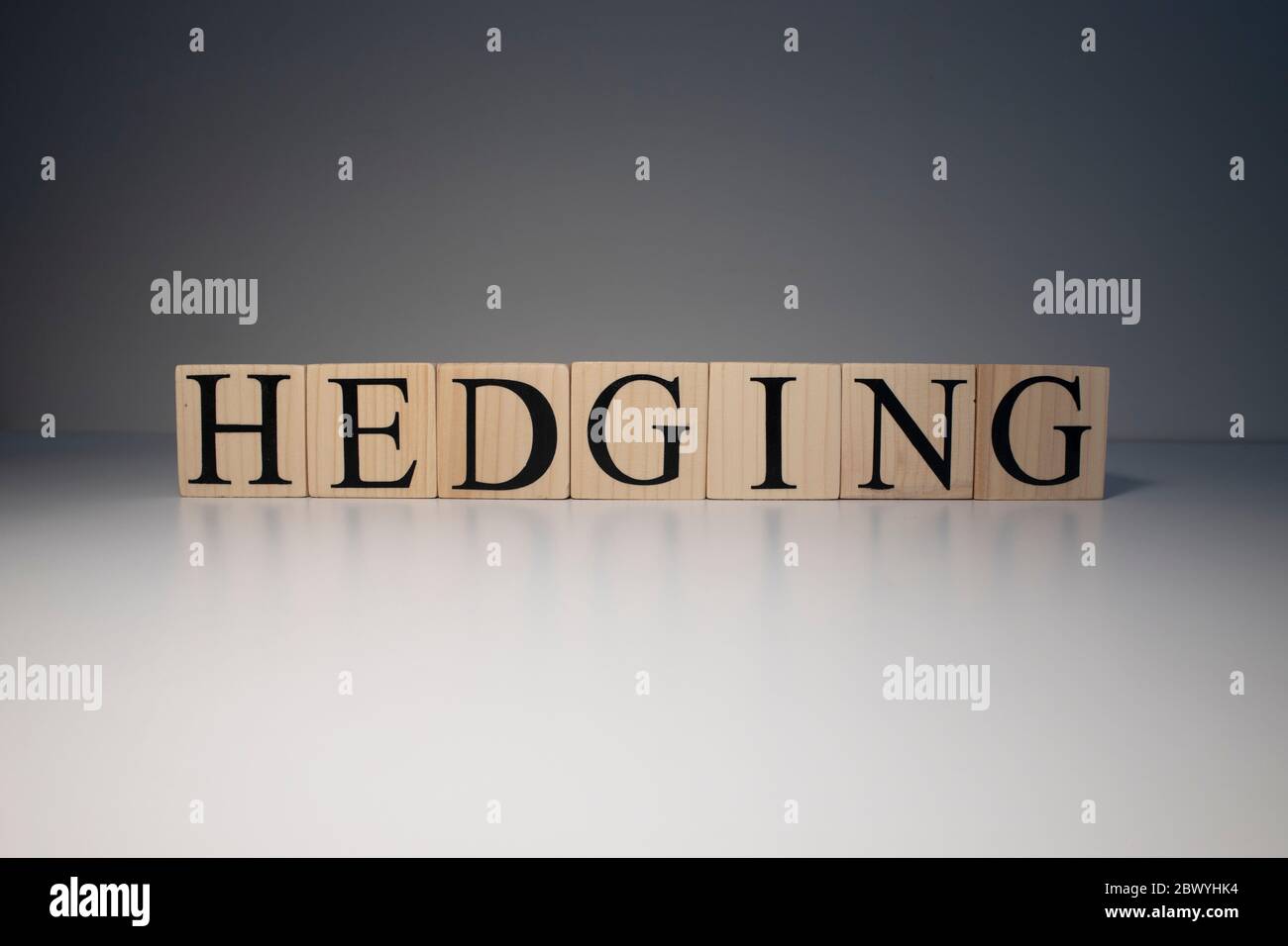 Hedging post on white background and with spot light Stock Photo - Alamy