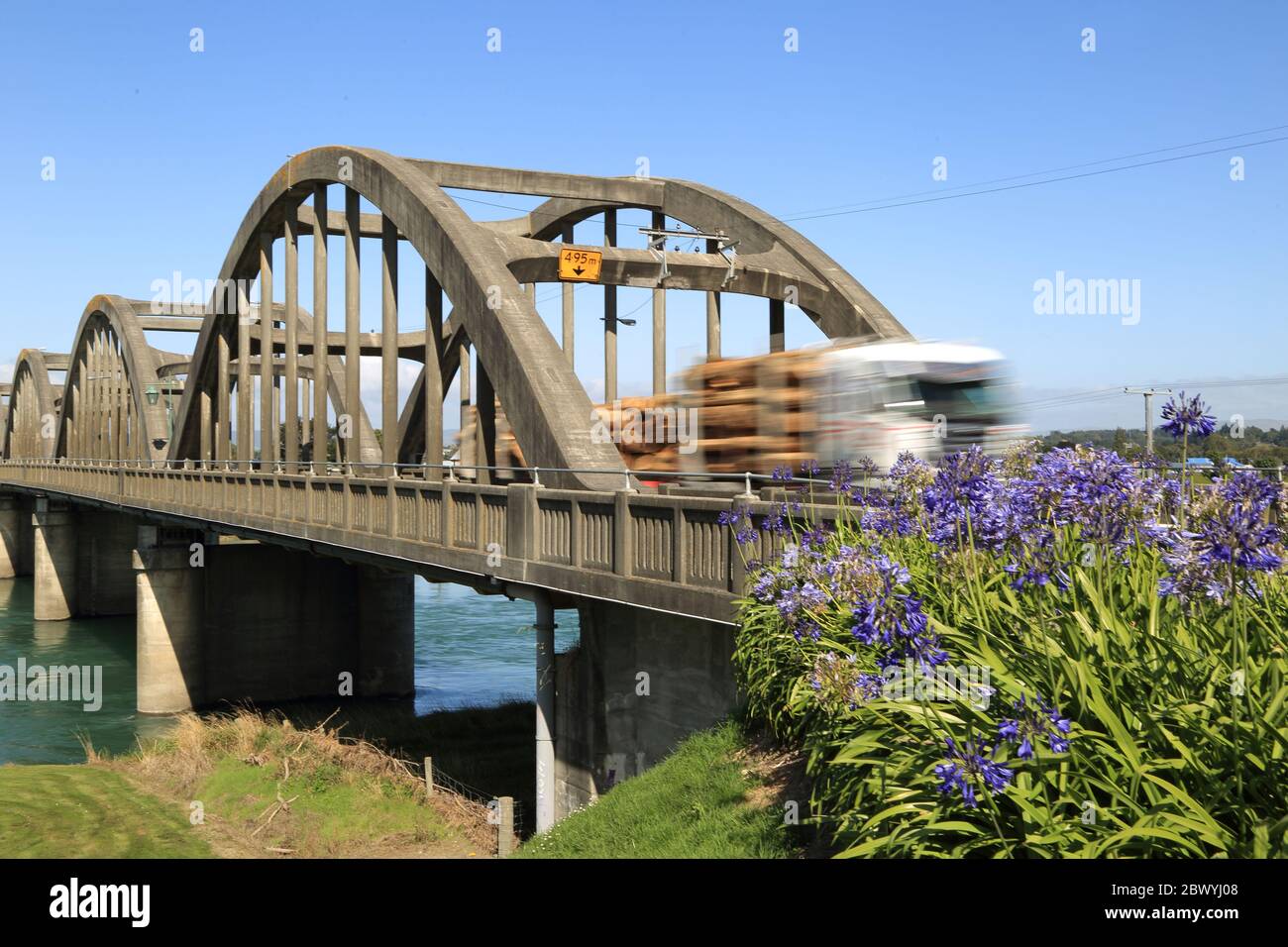 Logging truck on Balclutha Bridge, South Otago, New Zealand Stock Photo ...