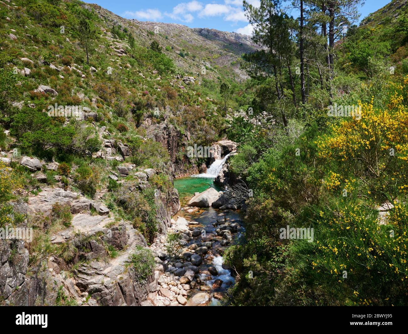 Waterfall and lake of portela do homem in Portugal on a spring sunny ...