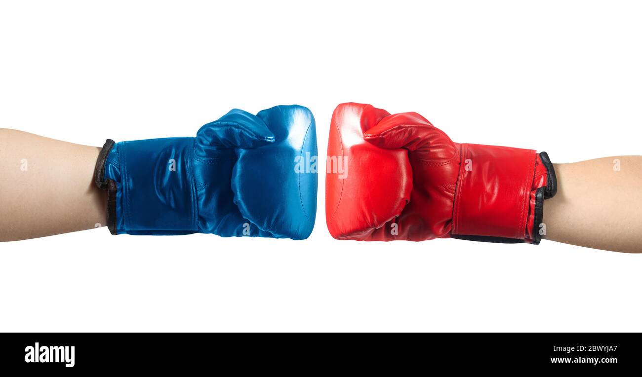 Isolated photo of male hands in red and blue boxing gloves punching on ...