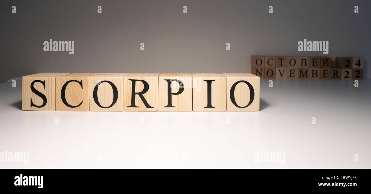 Scorpio word on wooden cubes on white background Stock Photo - Alamy