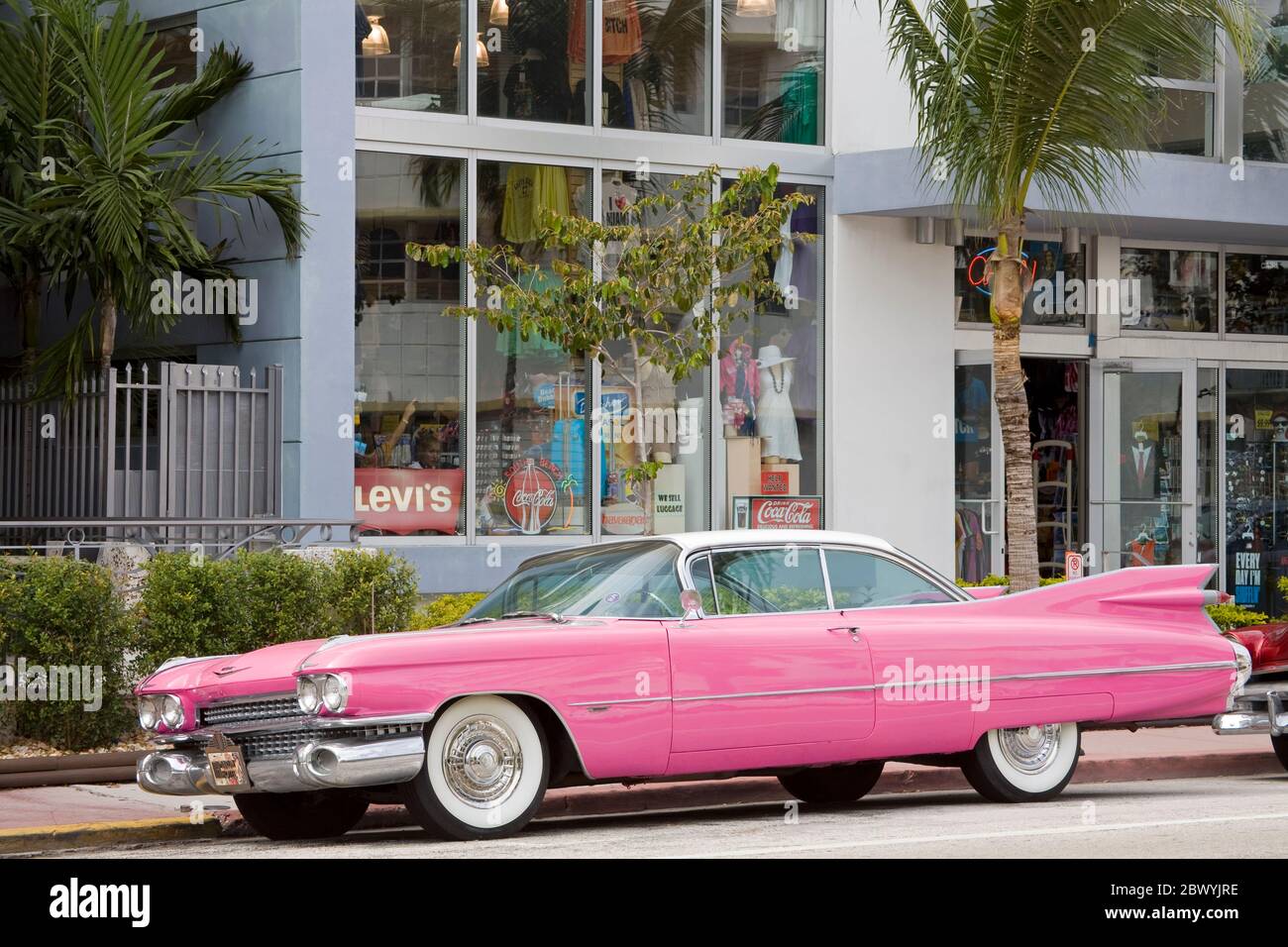Pink Cadillac on Collins Avenue, Miami Beach, Florida, USA Stock Photo ...