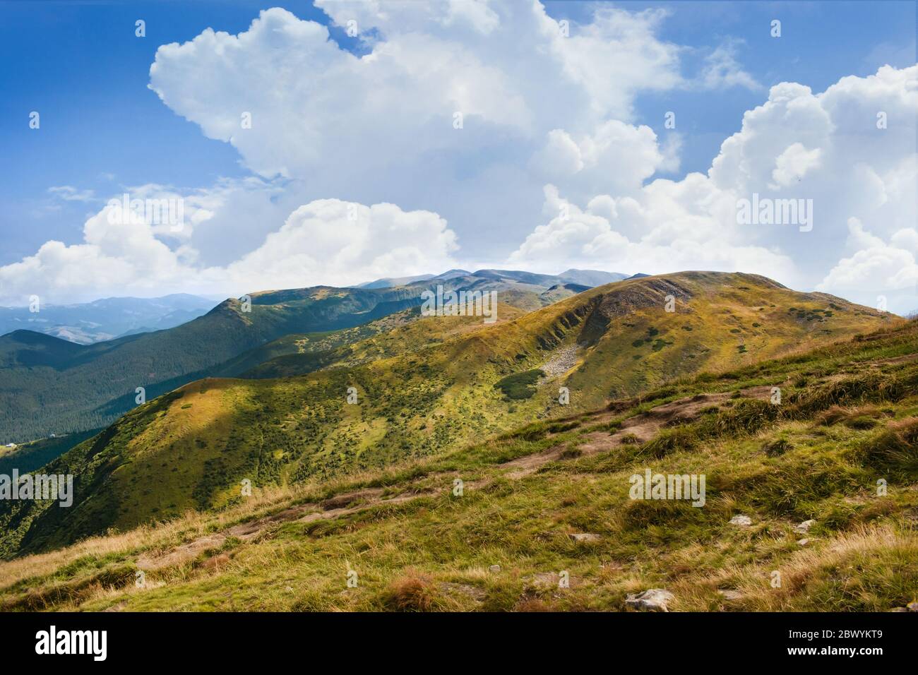 Wide landscape photo of sunny day sky mountain hills open space surface ...