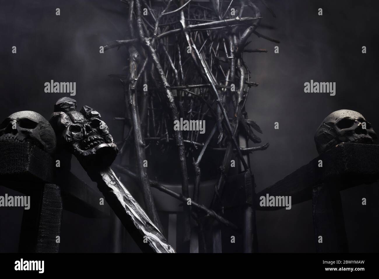 Close-up photo of evil witch throne made of branches with skulls and ...