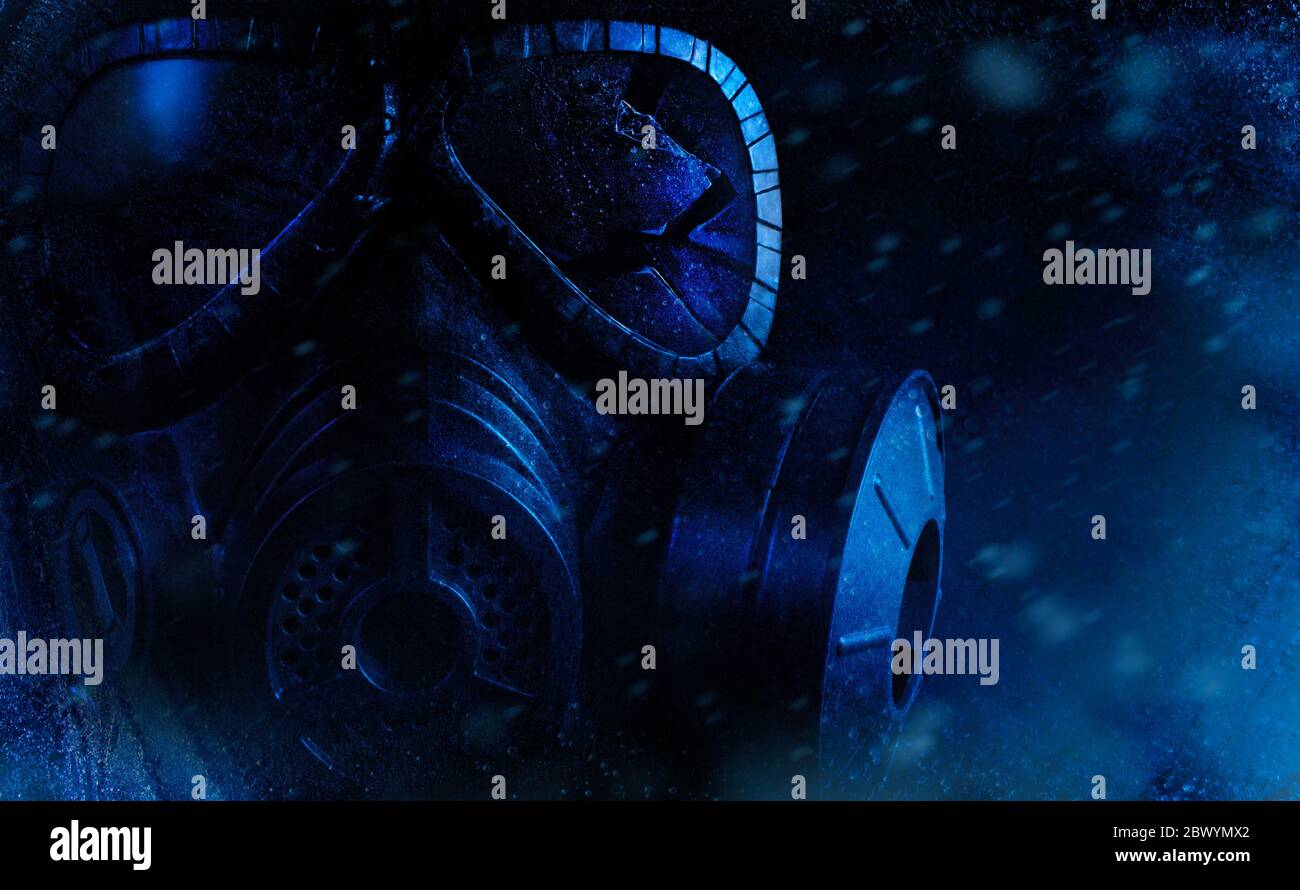 Photo of a broken glass military black gas mask laying frozen on black ...