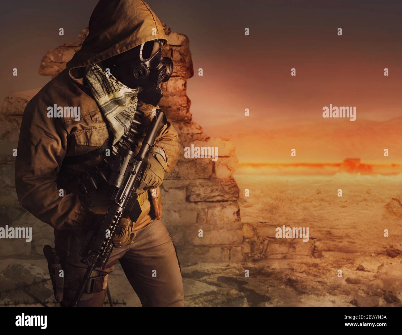 Photo of a desert post-apocalyptic soldier in tactical jacket, gas mask ...