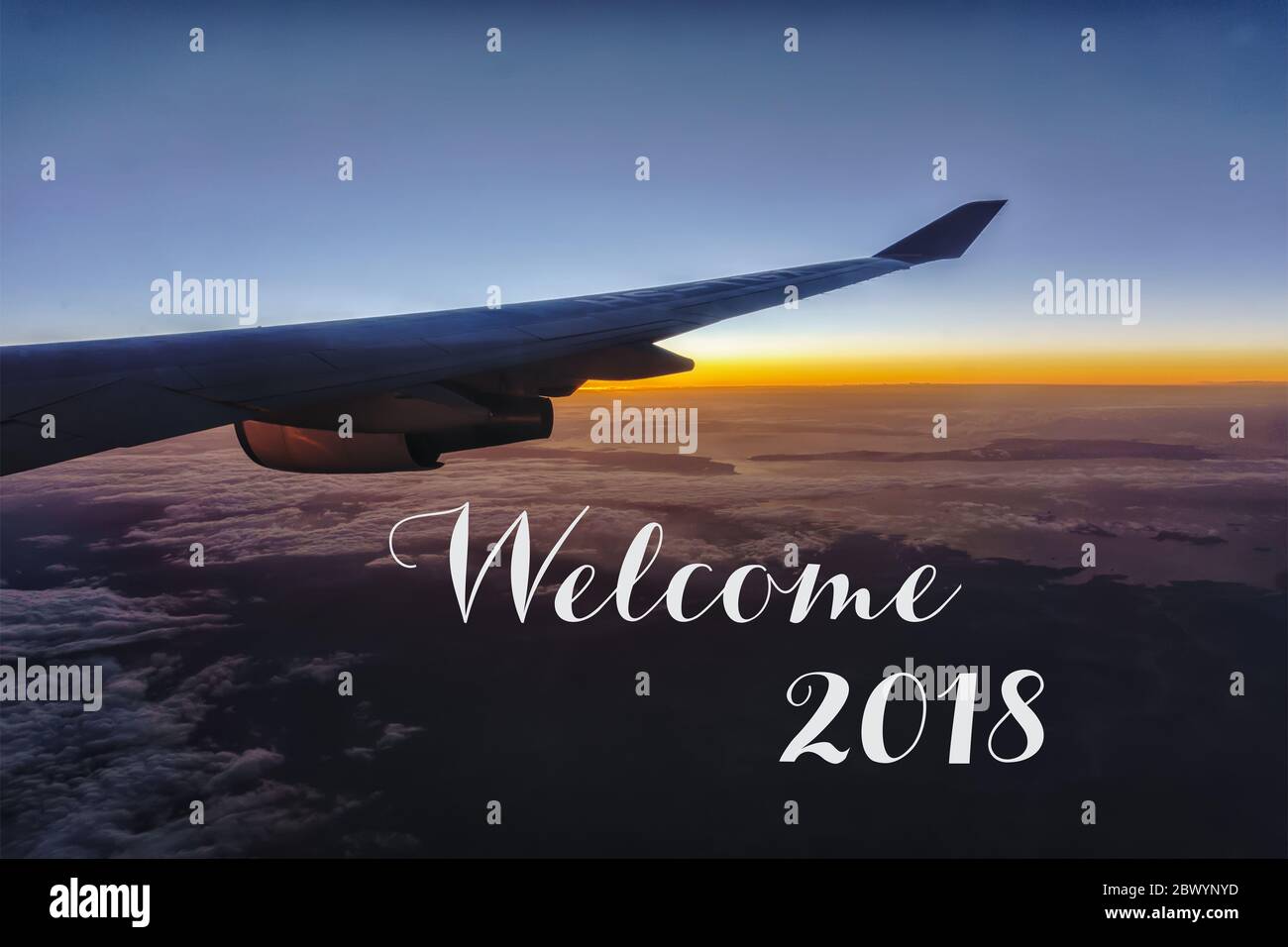 View from Aircraft windows to the plane wing with beautiful sunrise ...