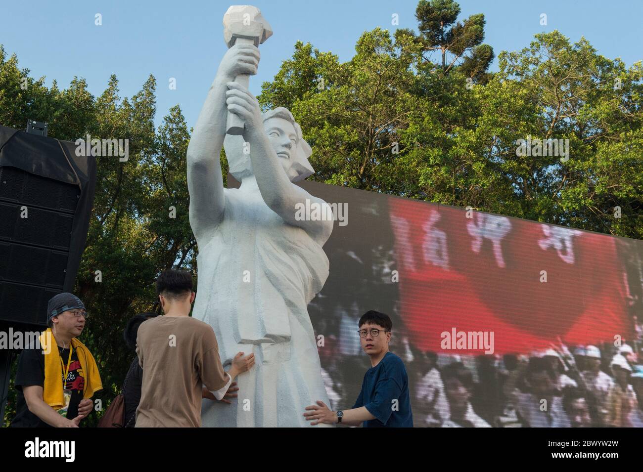 People install a Statue of a Goddess of Democracy in front of the ...