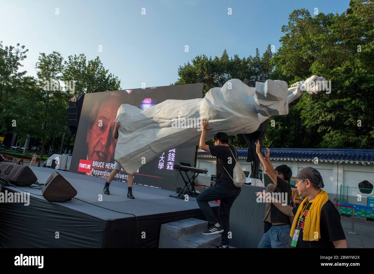 People install a Statue of a Goddess of Democracy in front of the ...