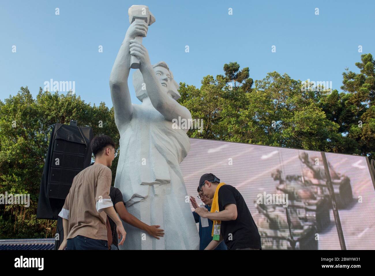 People install a Statue of a Goddess of Democracy in front of the ...