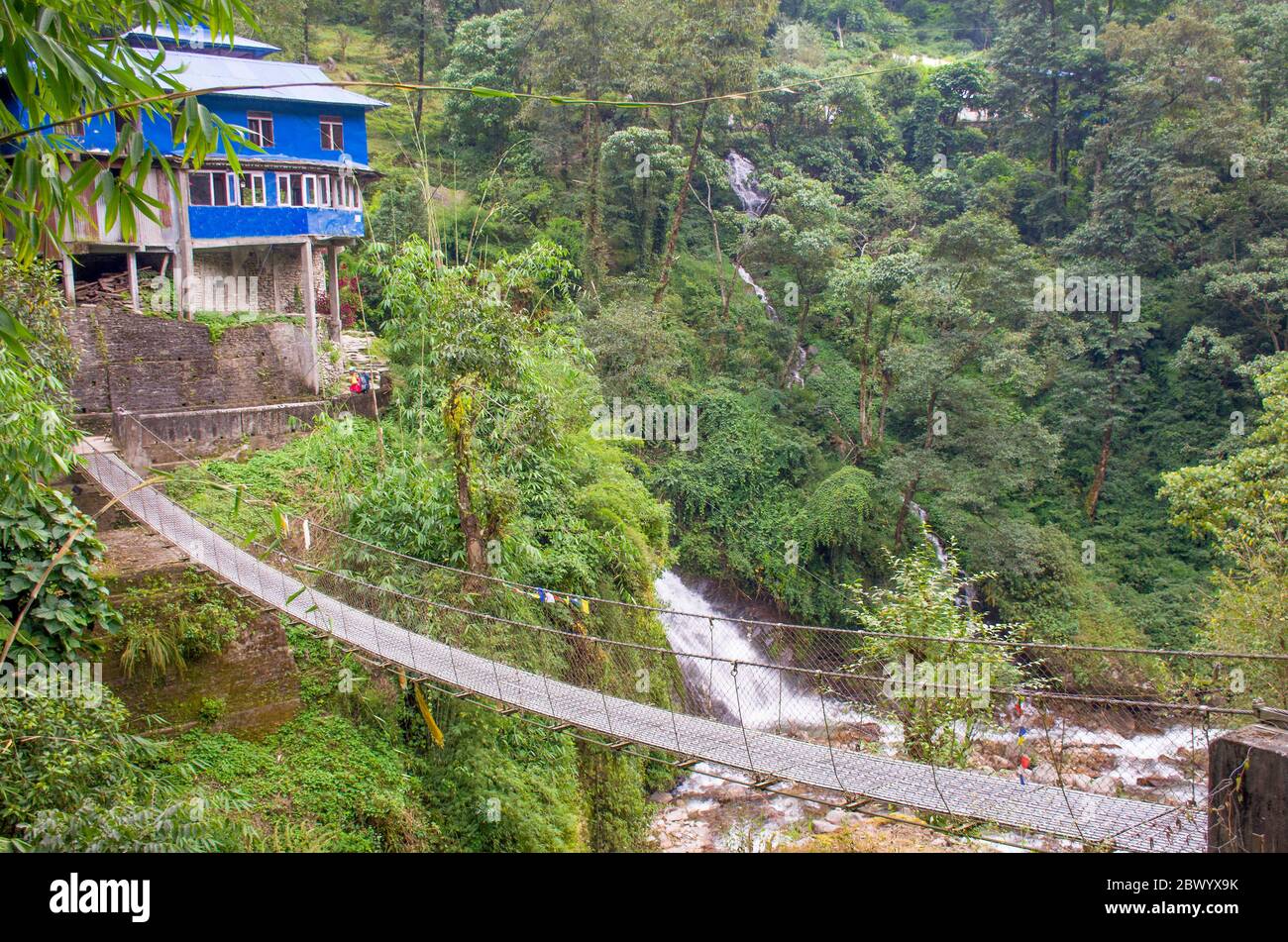 Bridge over the river beautiful tropical landscape of Mount Nepal ...