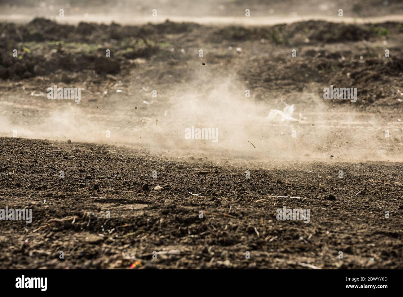 dirt fly after motocross roaring by Stock Photo - Alamy