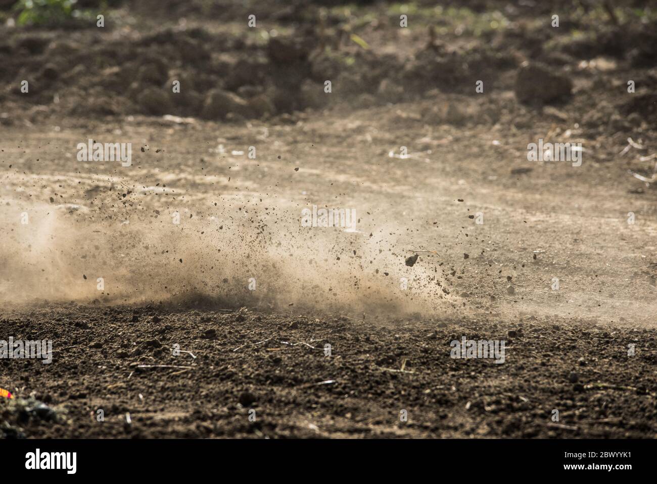 dirt fly after motocross roaring by Stock Photo - Alamy