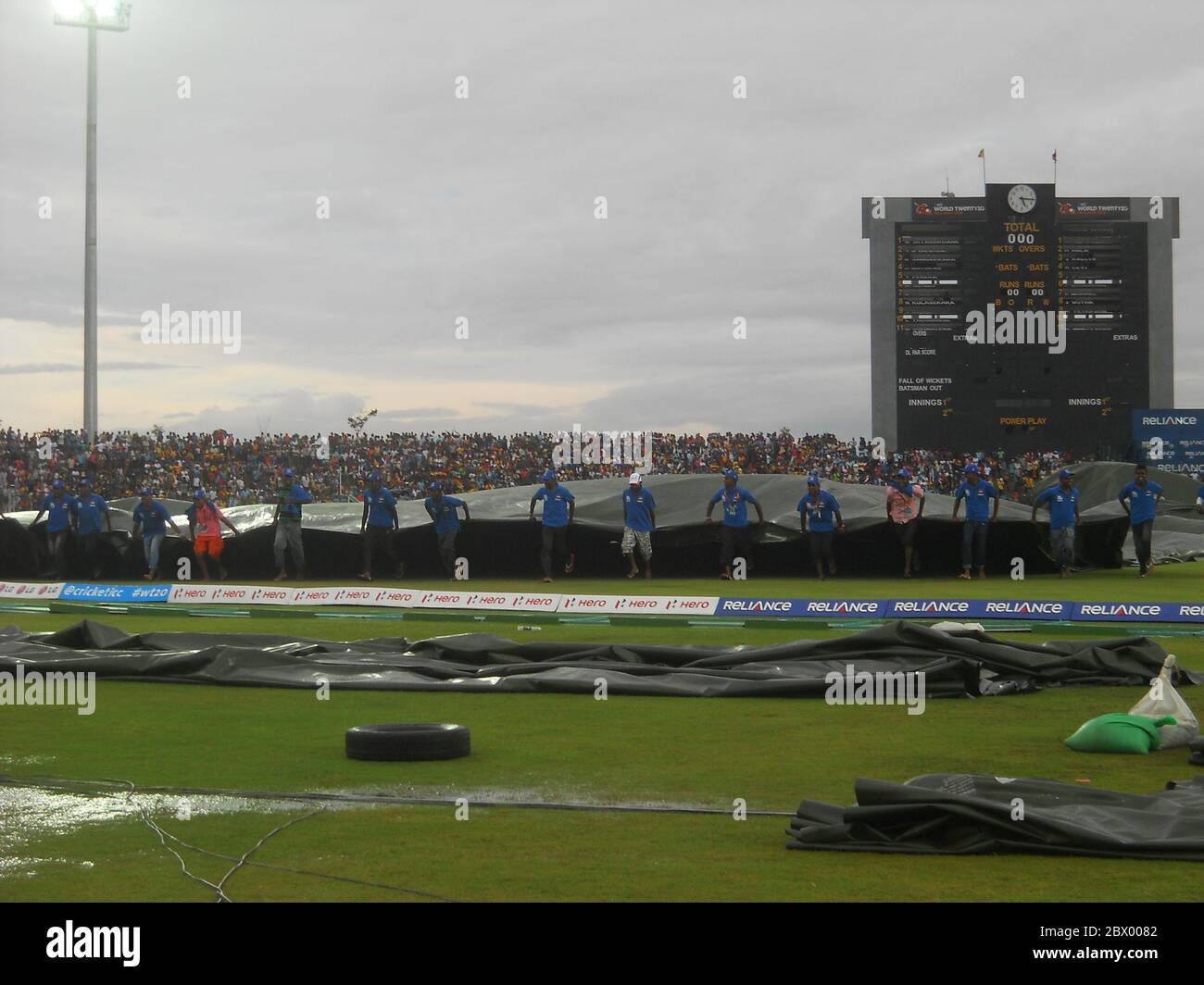 Cricket covers rain hi-res stock photography and images - Alamy